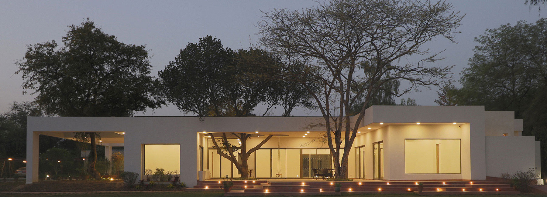 A House under the tree shade - by Spall Associates